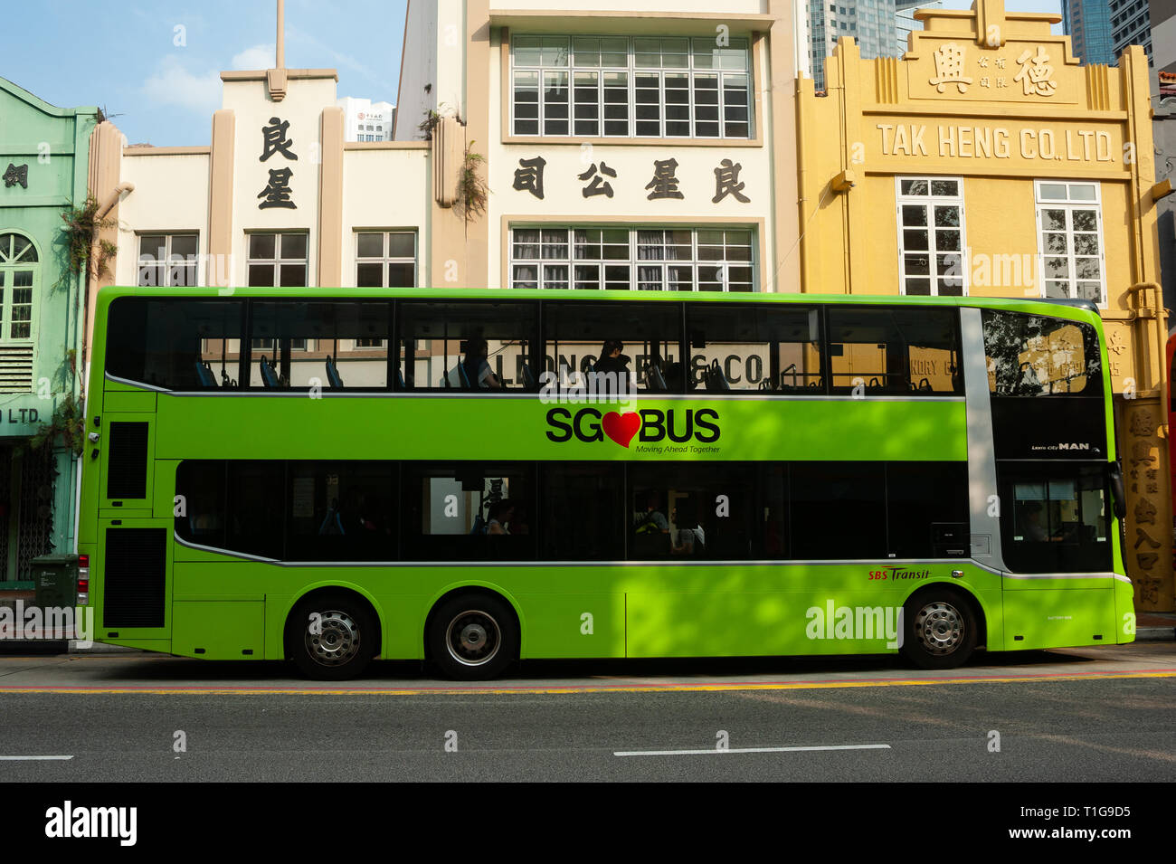 08.03.2019, Singapore, Singapore, Singapore - A city bus stops at a bus ...