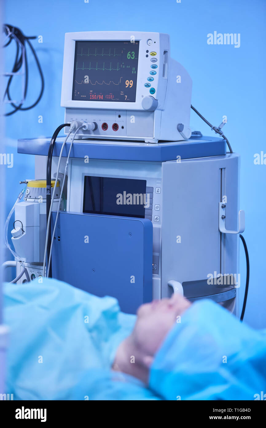 Functional vital functions monitor in an operating room with machines ...