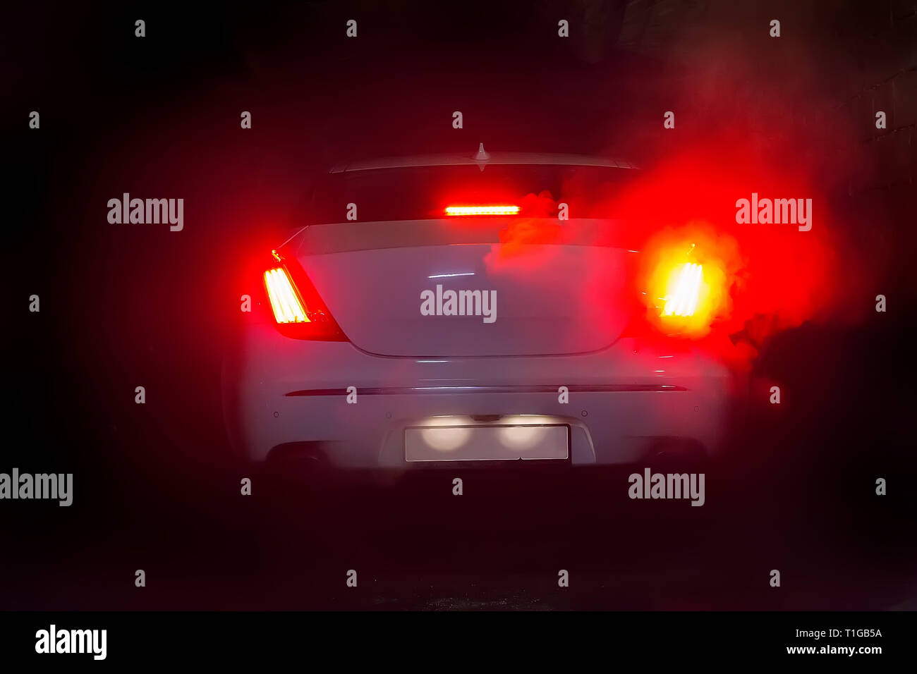 cars at night in the cold weather, rear view Stock Photo - Alamy