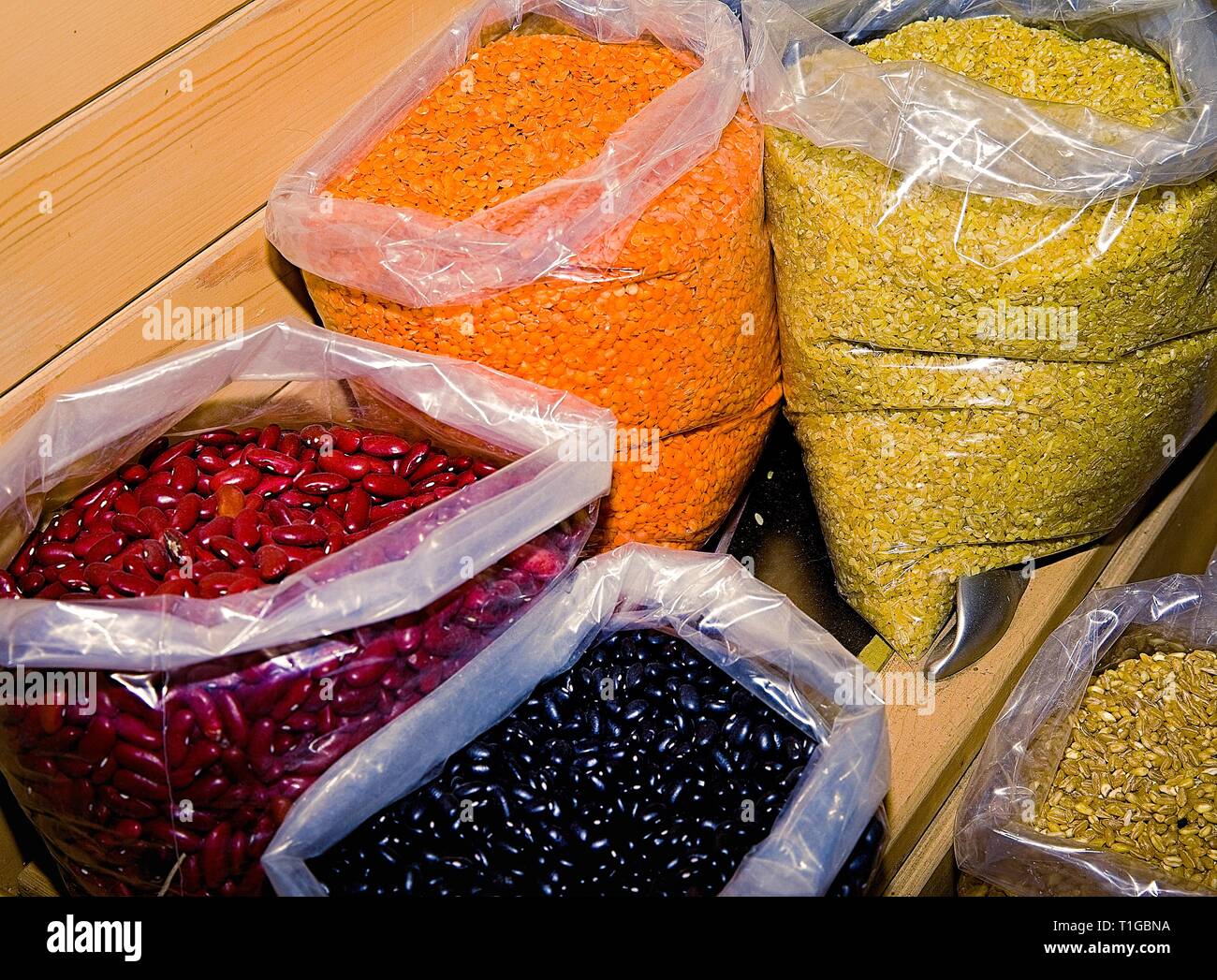 A variety of beans and lentils in plastic bag containers . Stock Image ...