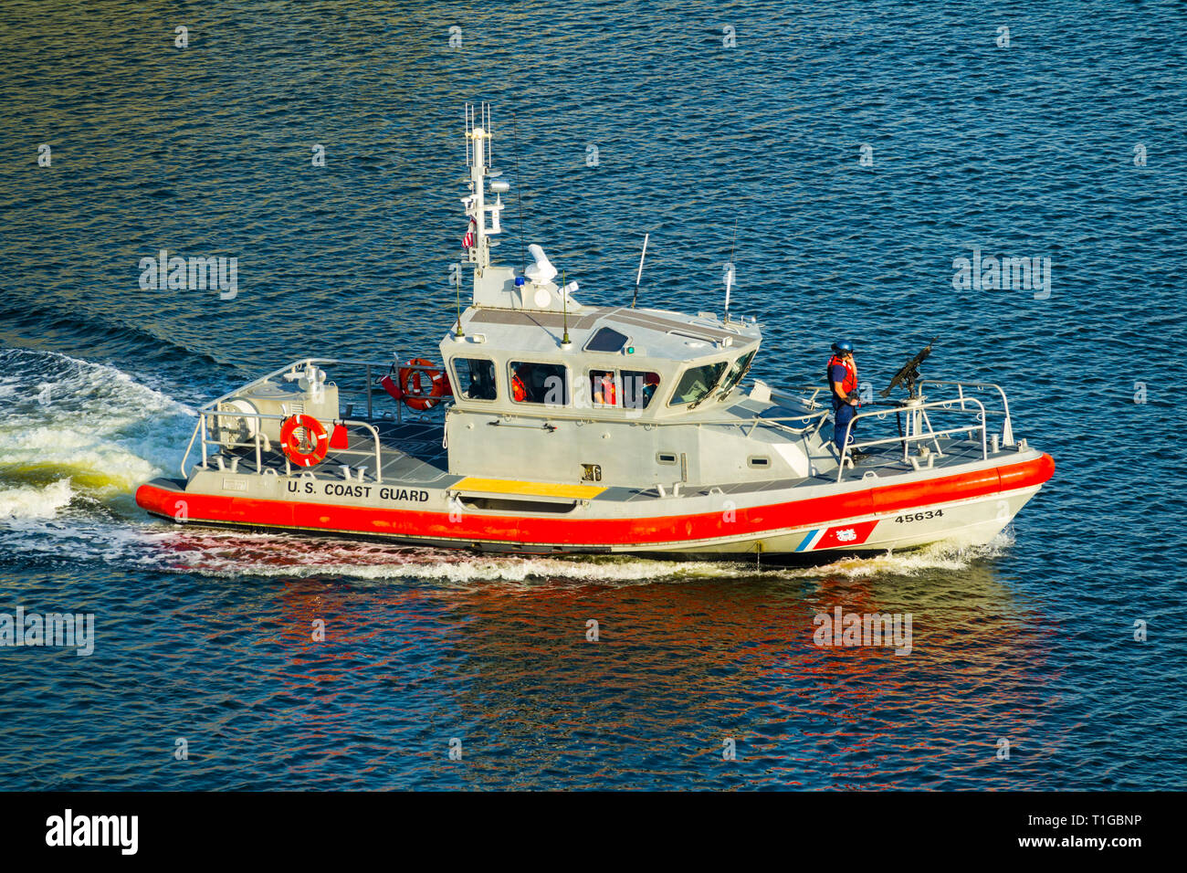 Sheriff boat meets with the US Coast Guard ship in Tampa Florida ...