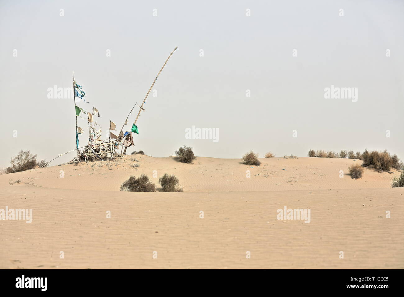 Votive flags-burial mound-Imam Asim's mazar or mausoleum area ...