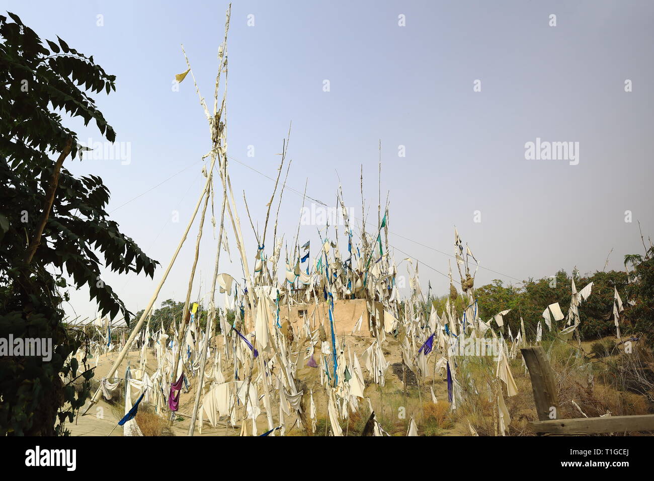 Votive flags-burial mound-Imam Asim's mazar or mausoleum area ...