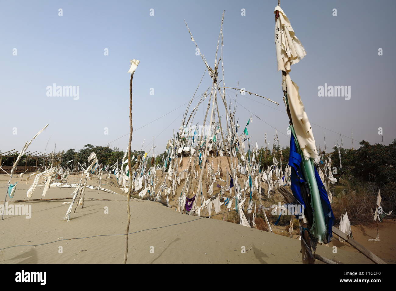 Votive flags-burial mound-Imam Asim's mazar or mausoleum area ...