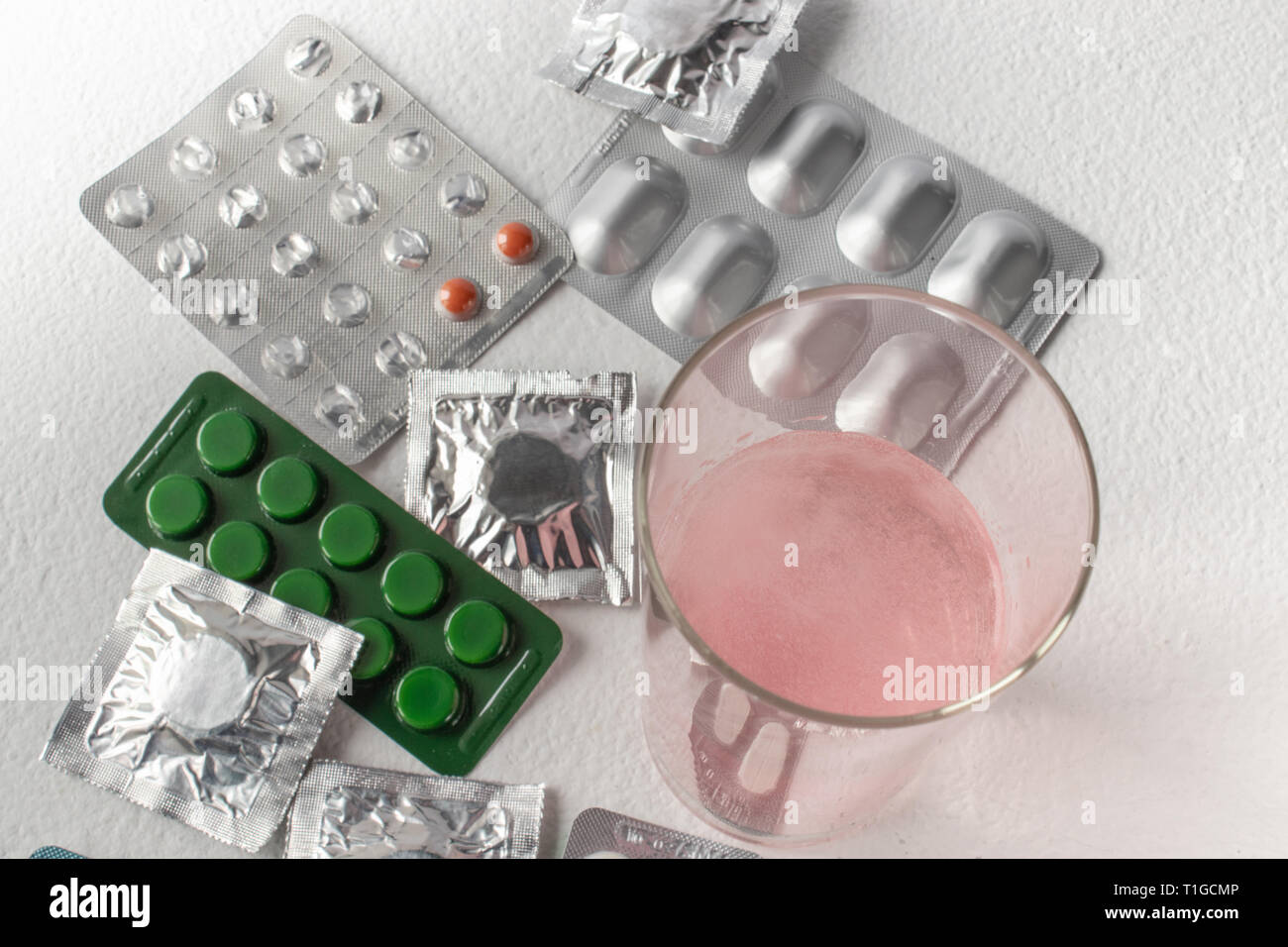 Pills. Different types of pills. soluble tablet in a glass of water ...
