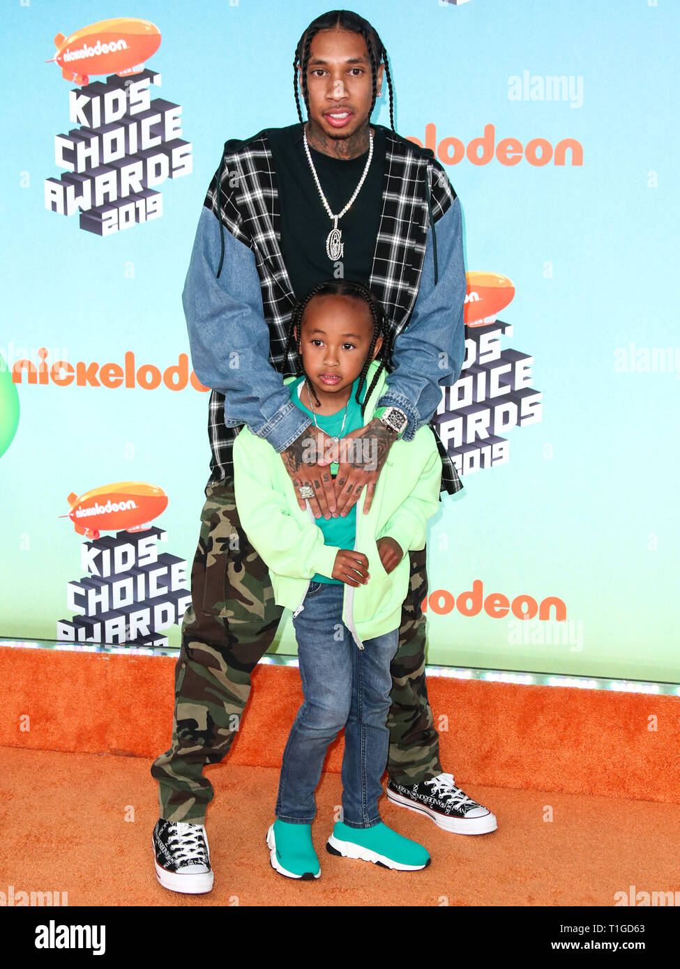 LOS ANGELES, CA, USA - MARCH 23: King Cairo Stevenson and Tyga arrive ...