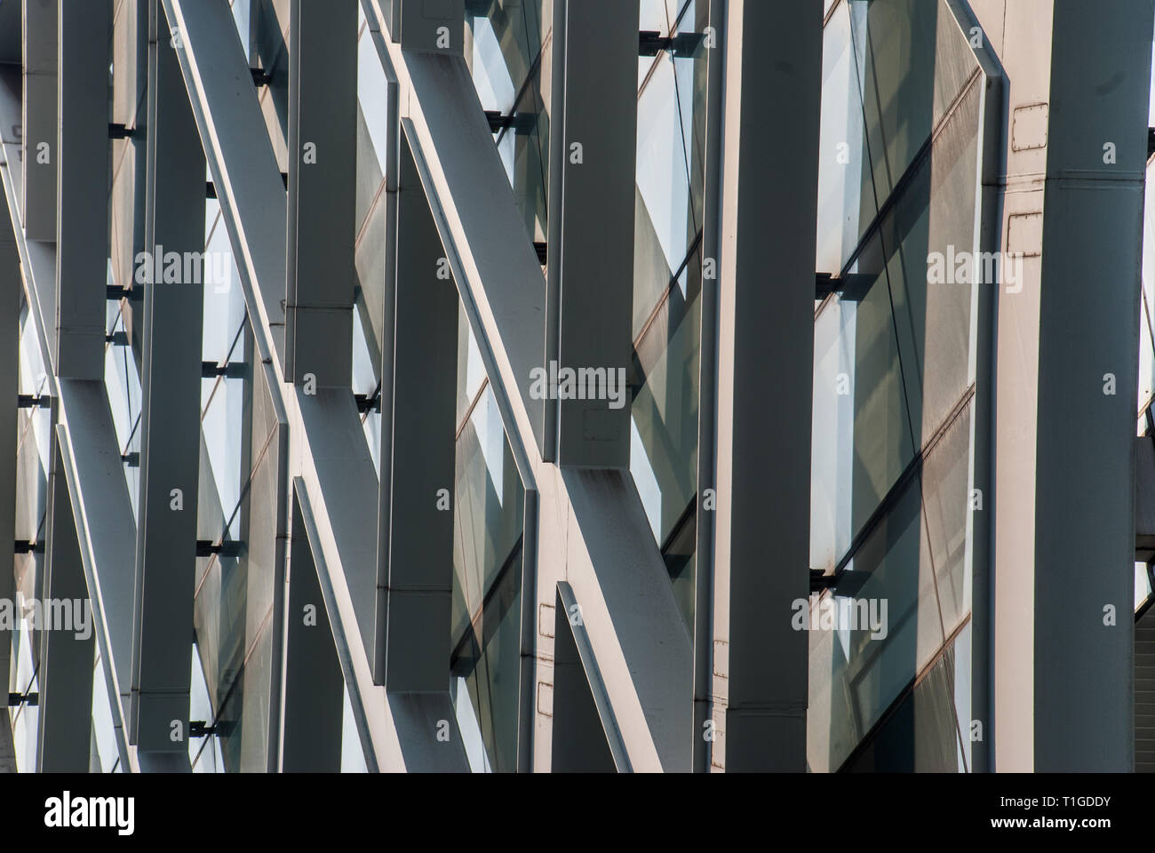 Abstract images of double lines and geometric shapes on buildings in ...