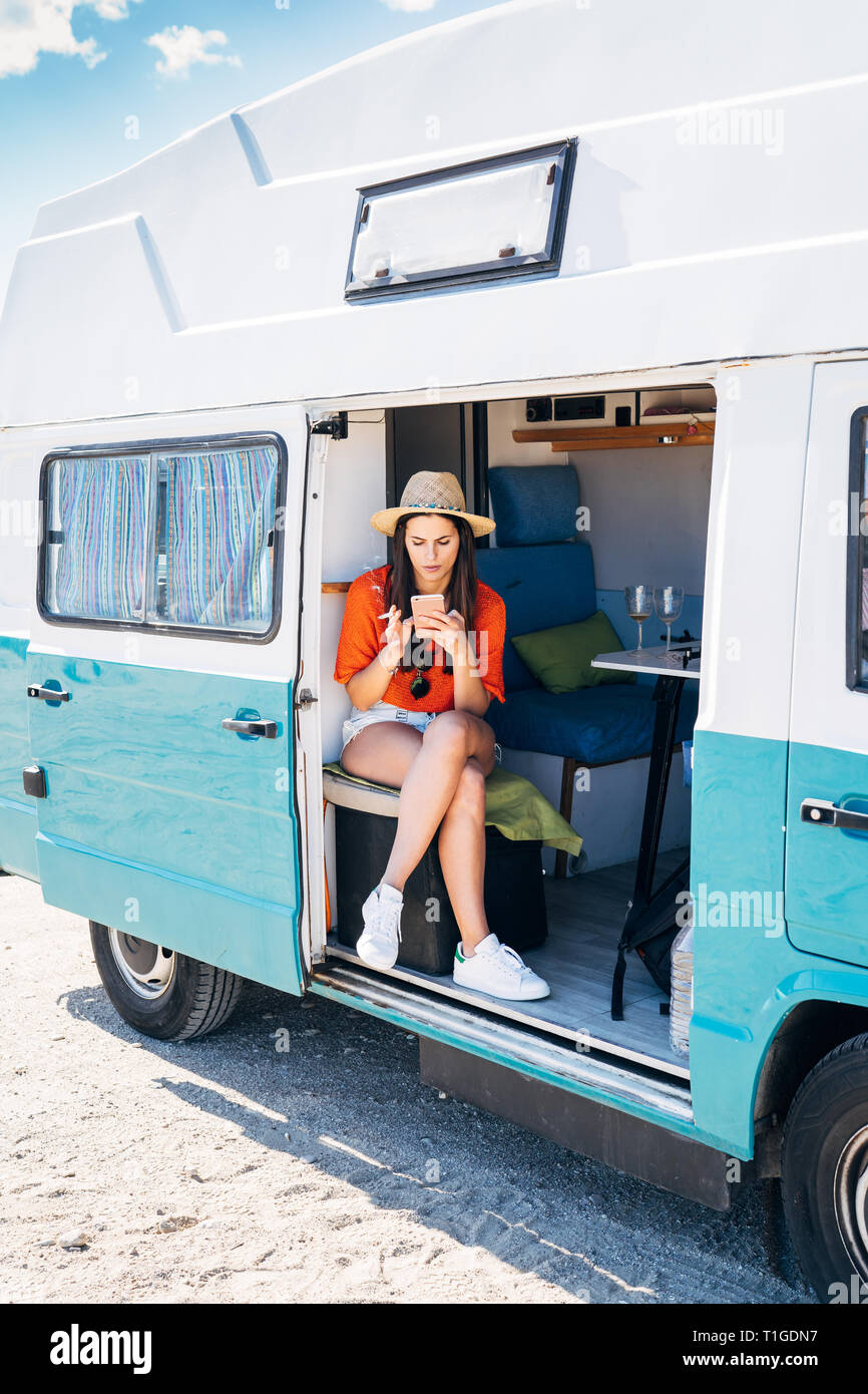 Family sitting inside camper van hi-res stock photography and images ...
