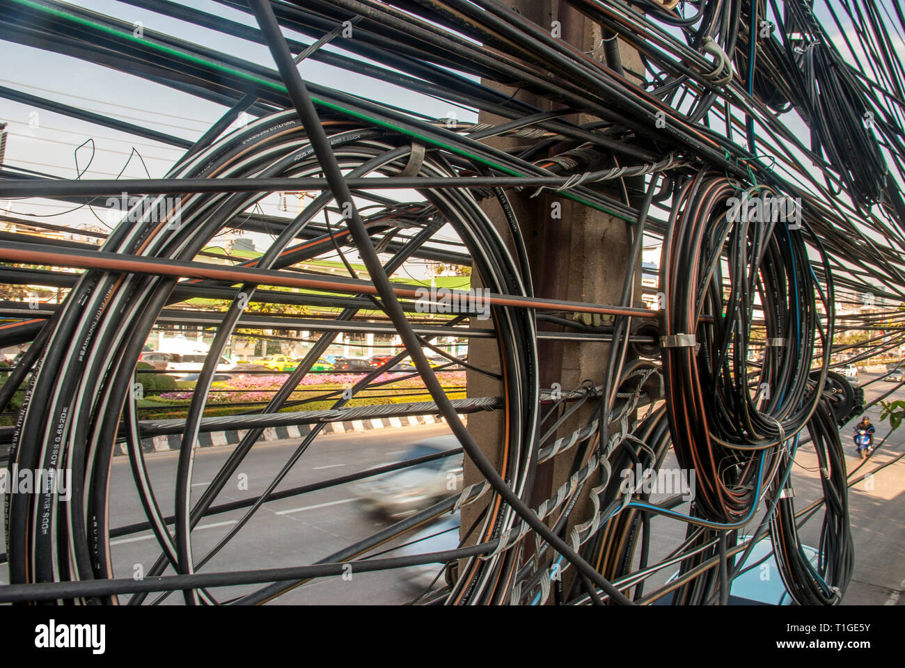 The wires that are messy, stick to the pole, are located in the streets ...