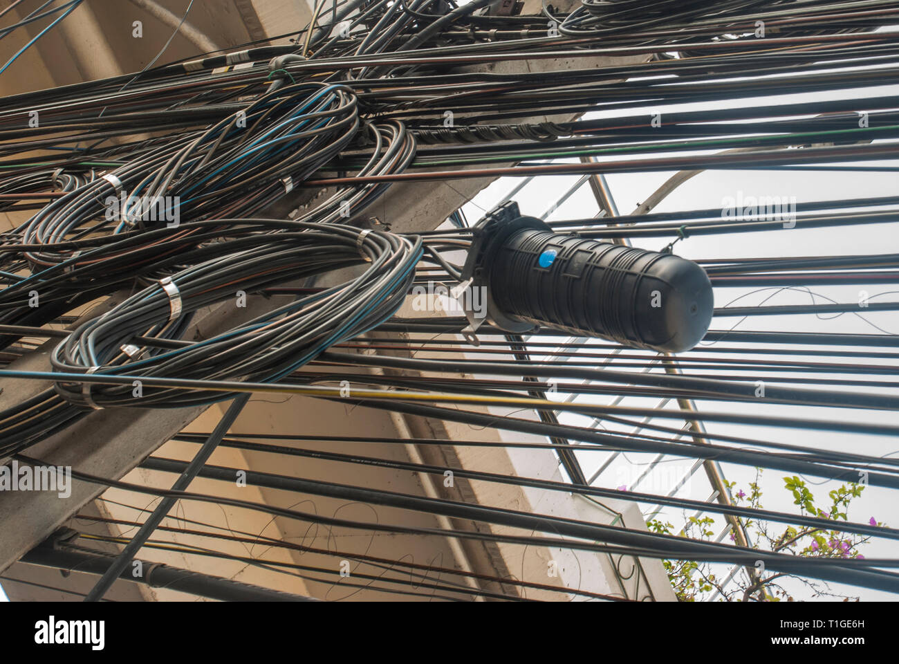 The wires that are messy, stick to the pole, are located in the streets ...