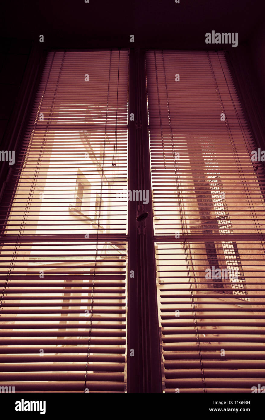 Window with blinds with a view of an urban courtyard Stock Photo - Alamy