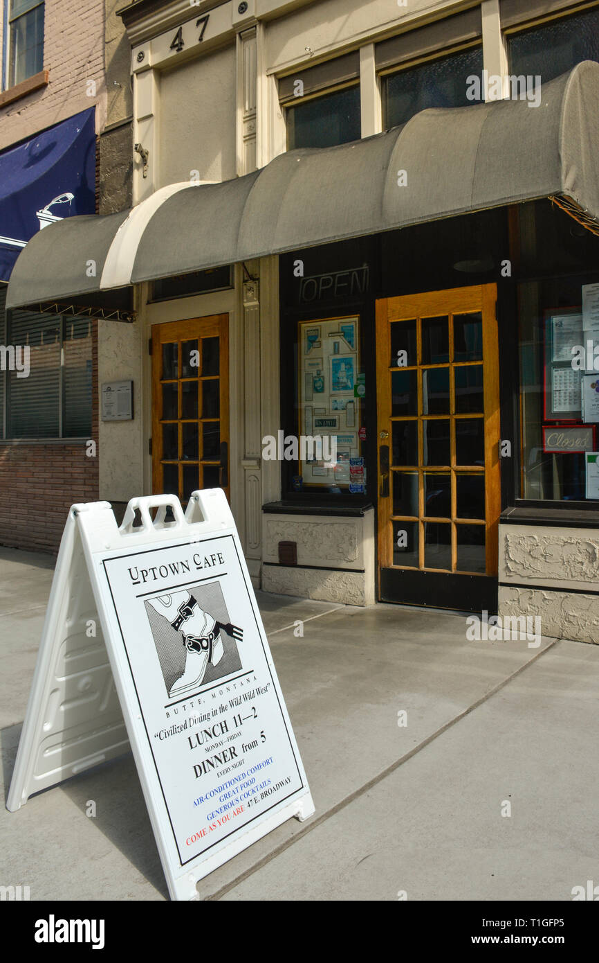 A sandwich board advertisement in front of the Uptown Cafe, a popular ...