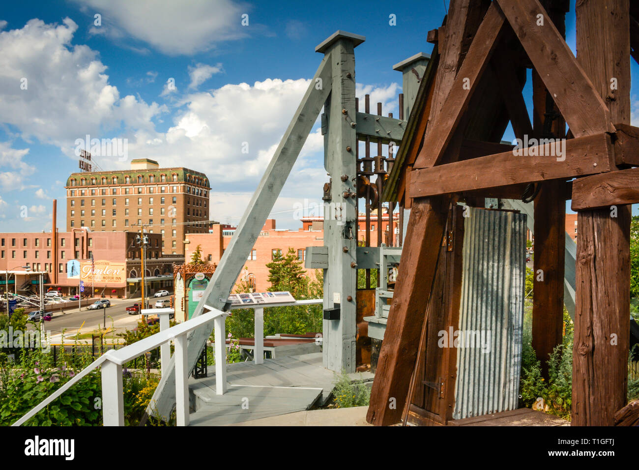 Overlooking downtown from a mine headframe over an old mine shaft, with ...