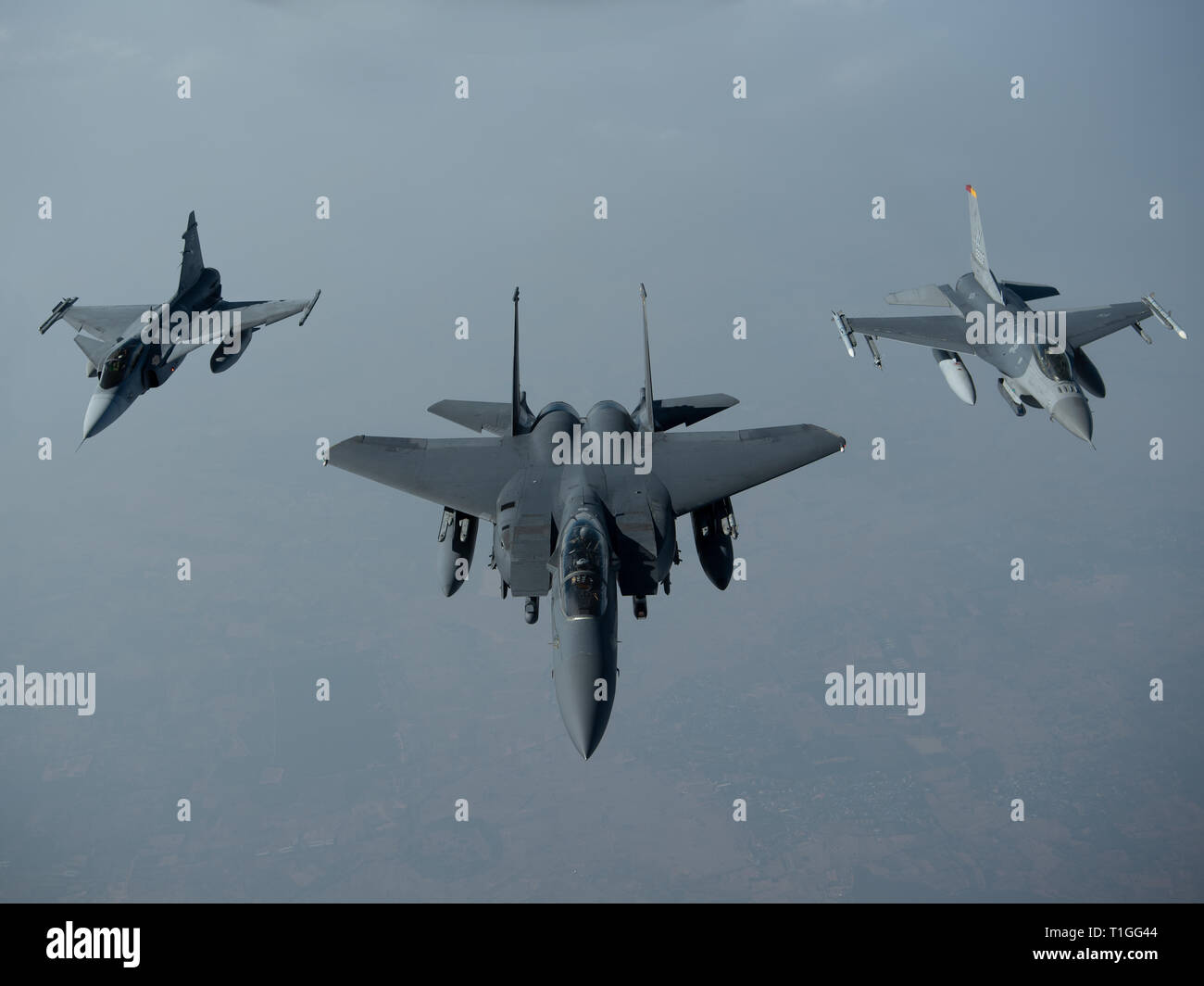 A Republic of Singapore air force F-15SG leads a multi-nation ...