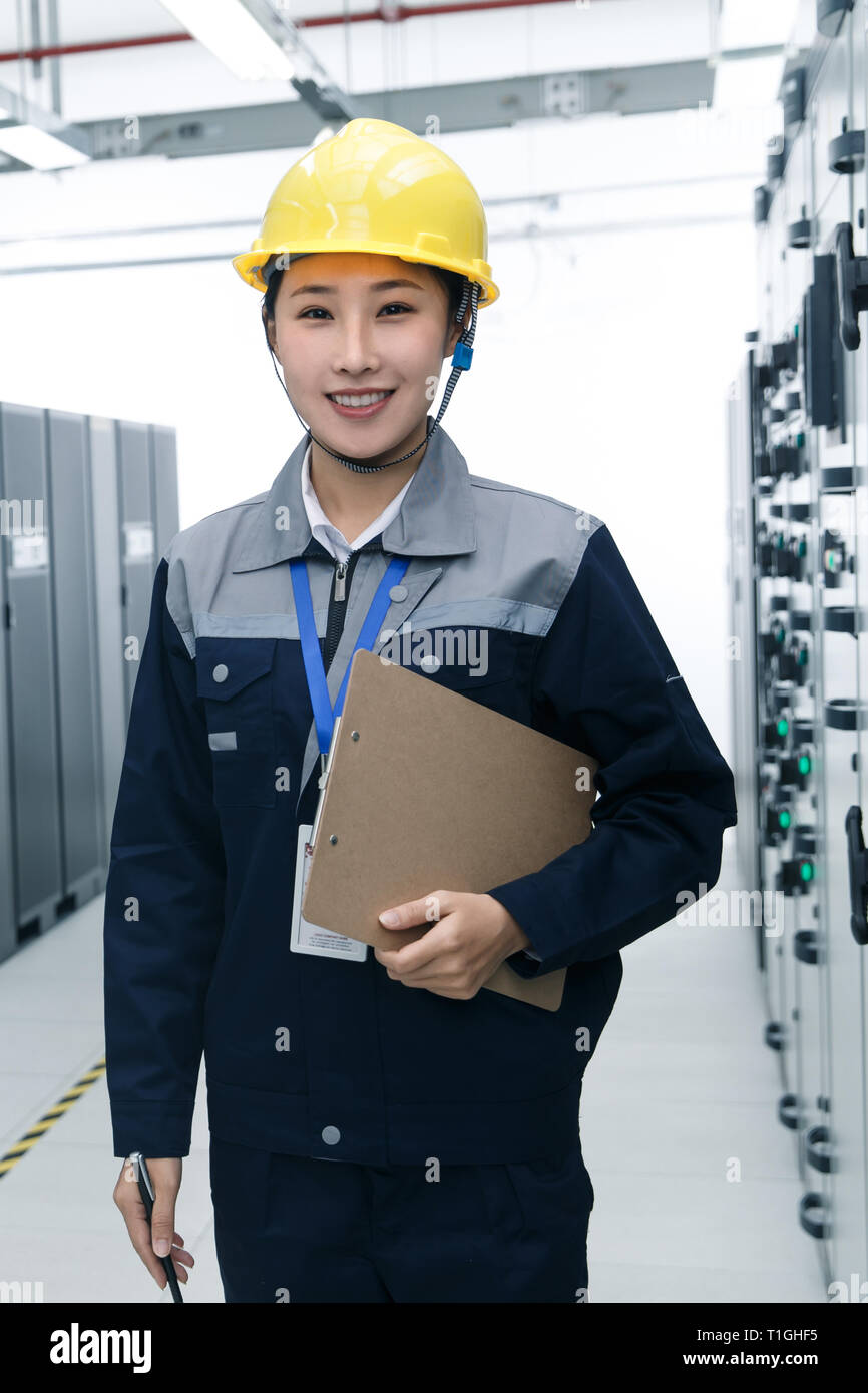 Technicians work in a factory Stock Photo - Alamy