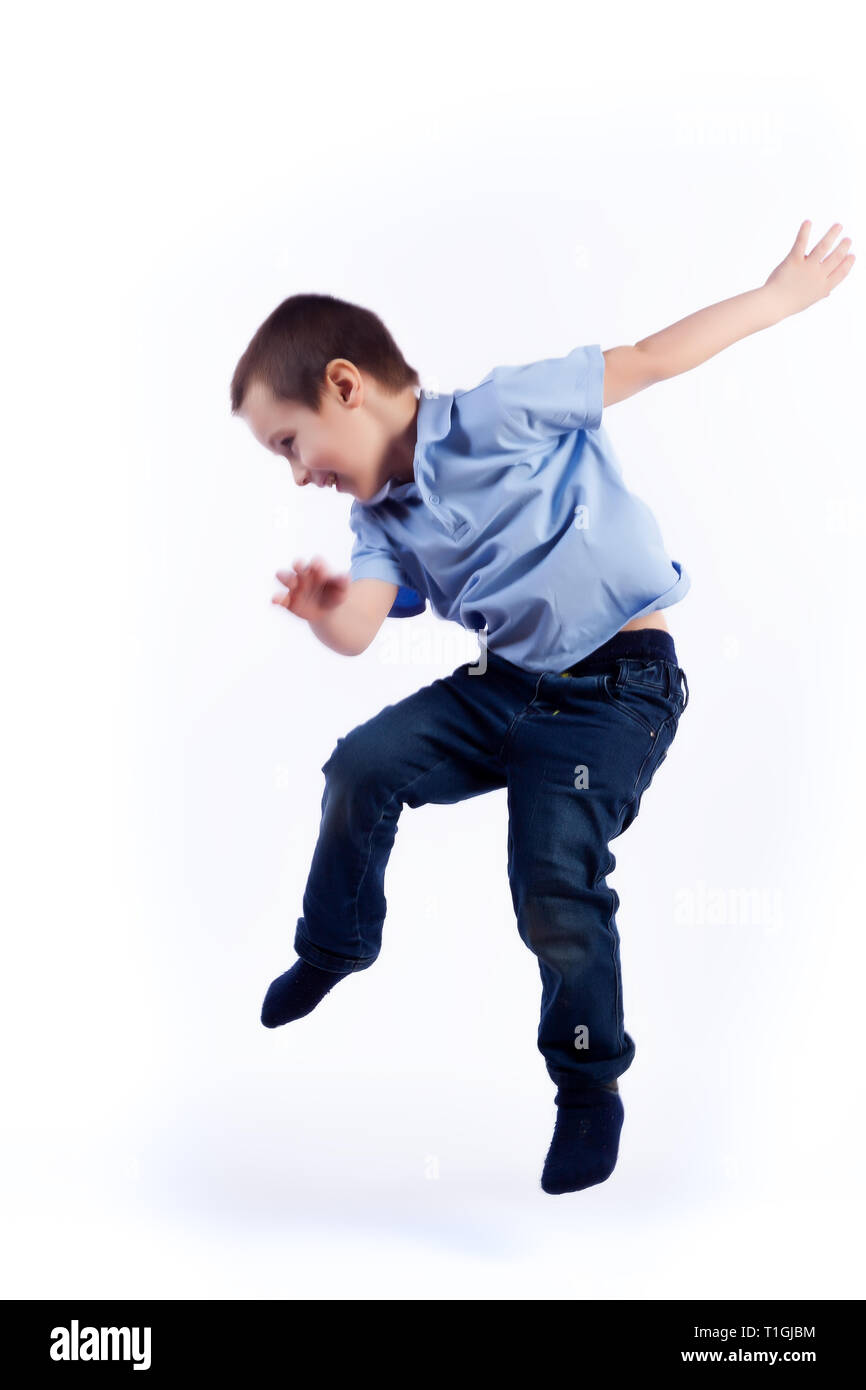 Kid jumping on one leg hi-res stock photography and images - Alamy