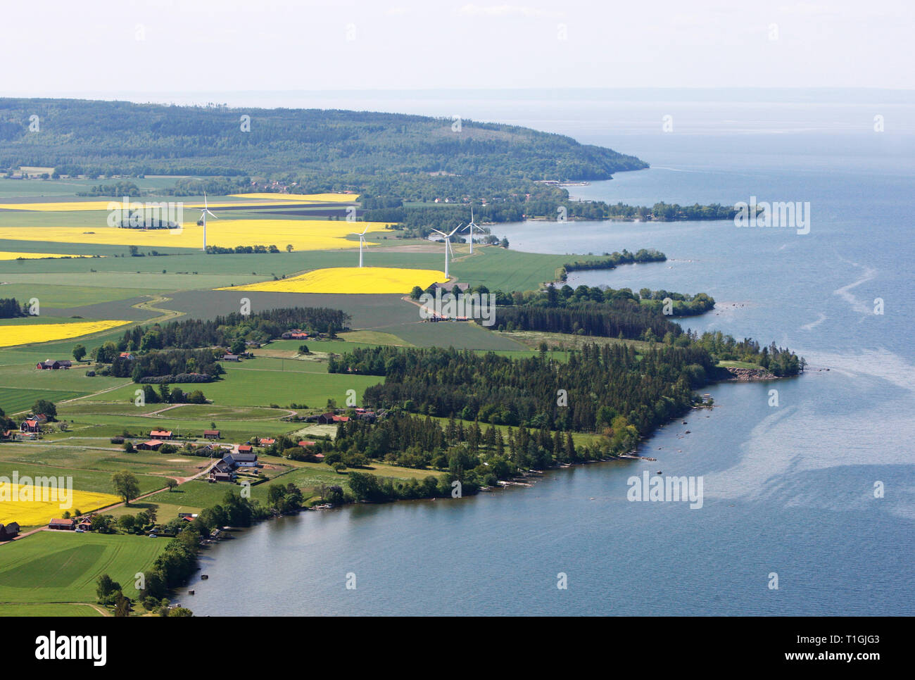 VADSTENA 2008-05-26 Aerial view of "Östgötaslätten" that meets Lake ...