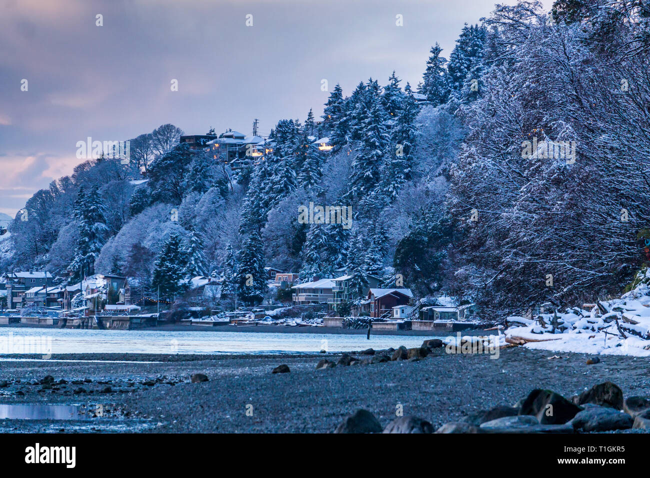 A view of Three Tree Point in Burien, Washington. It is evening on a ...
