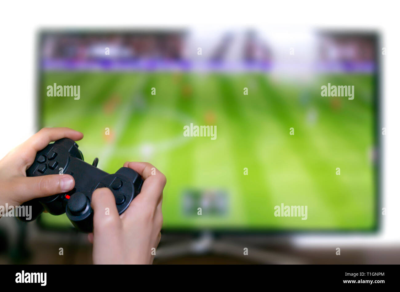 Boy tv remote hi-res stock photography and images - Alamy