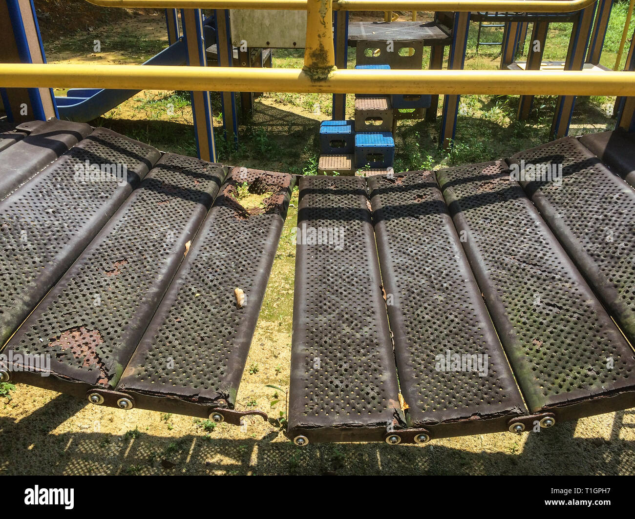Health and safety in a playpark in Malaysia Stock Photo - Alamy