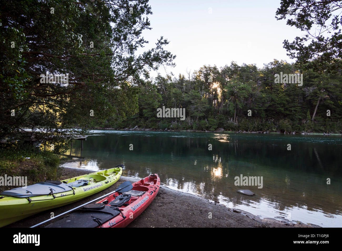 Colorful kayaks on the Arrayanes river riverside, Esquel, Patagonia ...