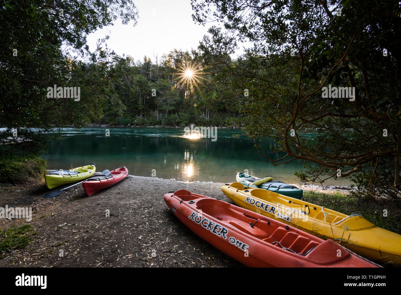 Colorful kayaks on the Arrayanes river riverside, Esquel, Patagonia ...