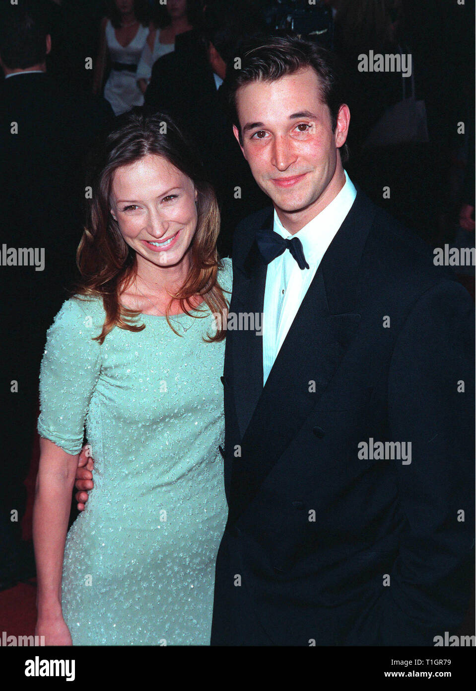 LOS ANGELES, CA - January 11, 1999: "ER" star NOAH WYLE & wife at the ...