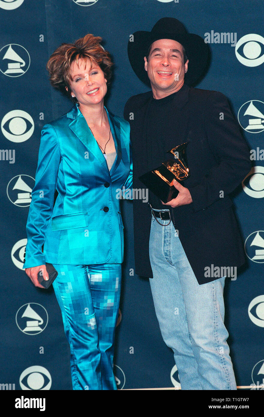 LOS ANGELES, CA - February 25, 1999: Country singer CLINT BLACK & wife ...