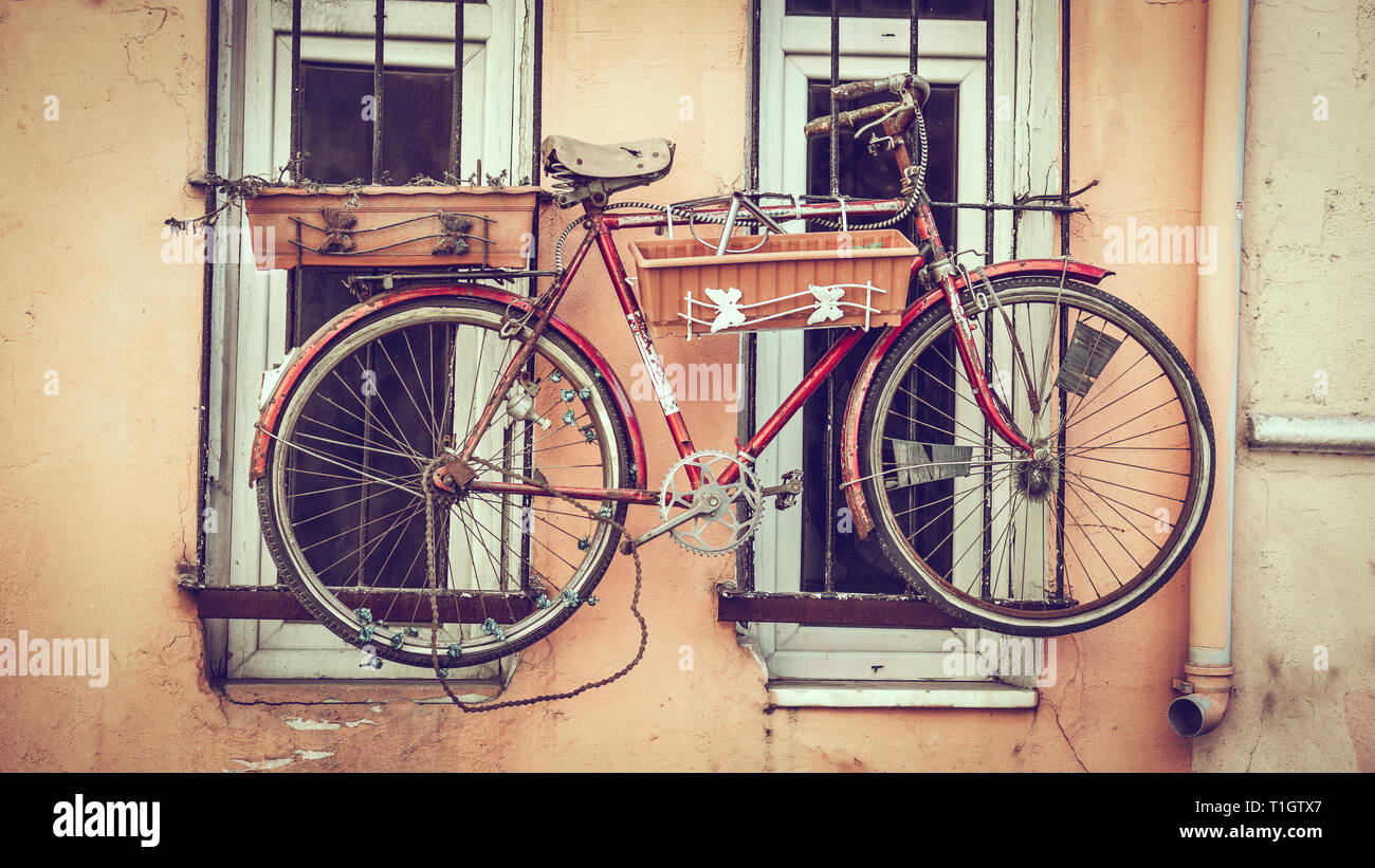 Old decorative bicycle on window Stock Photo - Alamy