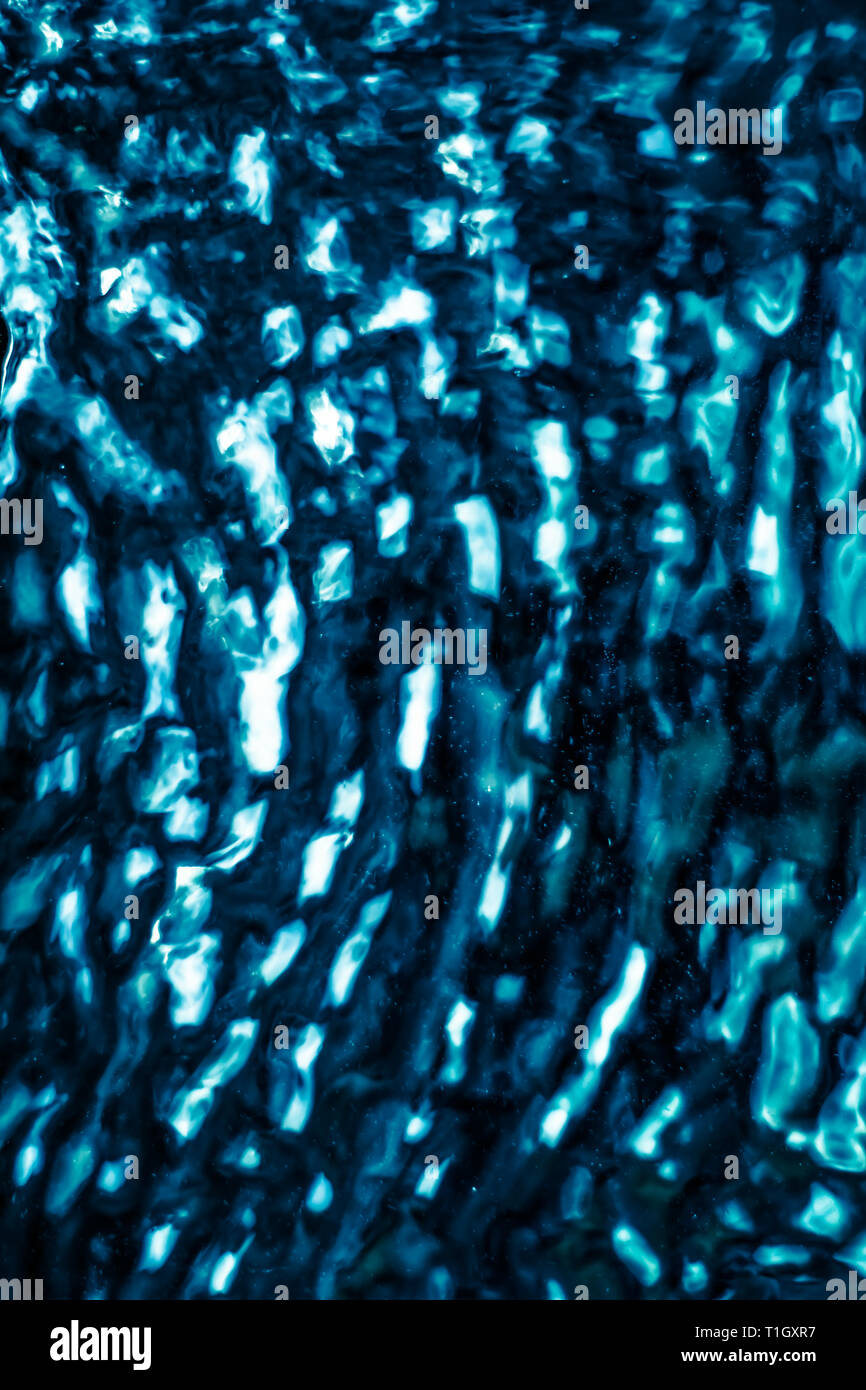 Abstract blue liquid surface as background - futuristic design and ...