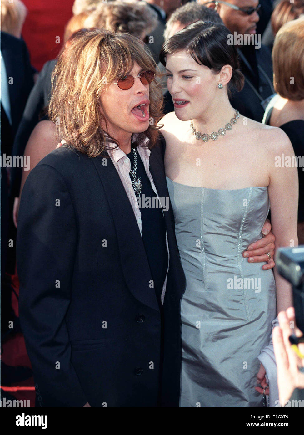 LOS ANGELES, CA - March 21, 1999: Actress LIV TYLER & father Aerosmith ...