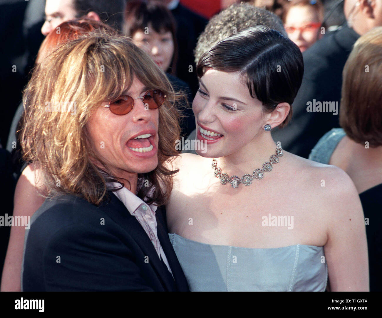LOS ANGELES, CA - March 21, 1999: Actress LIV TYLER & father Aerosmith ...
