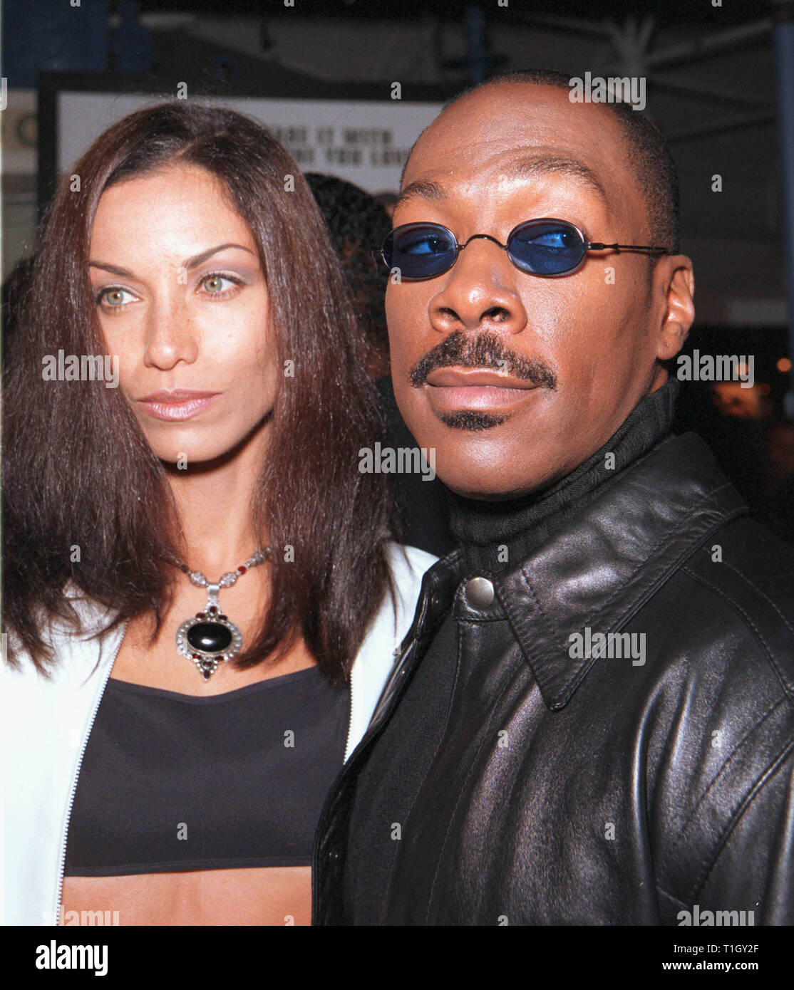 LOS ANGELES, CA - April 13, 1999: Actor EDDIE MURPHY & wife Nicole ...