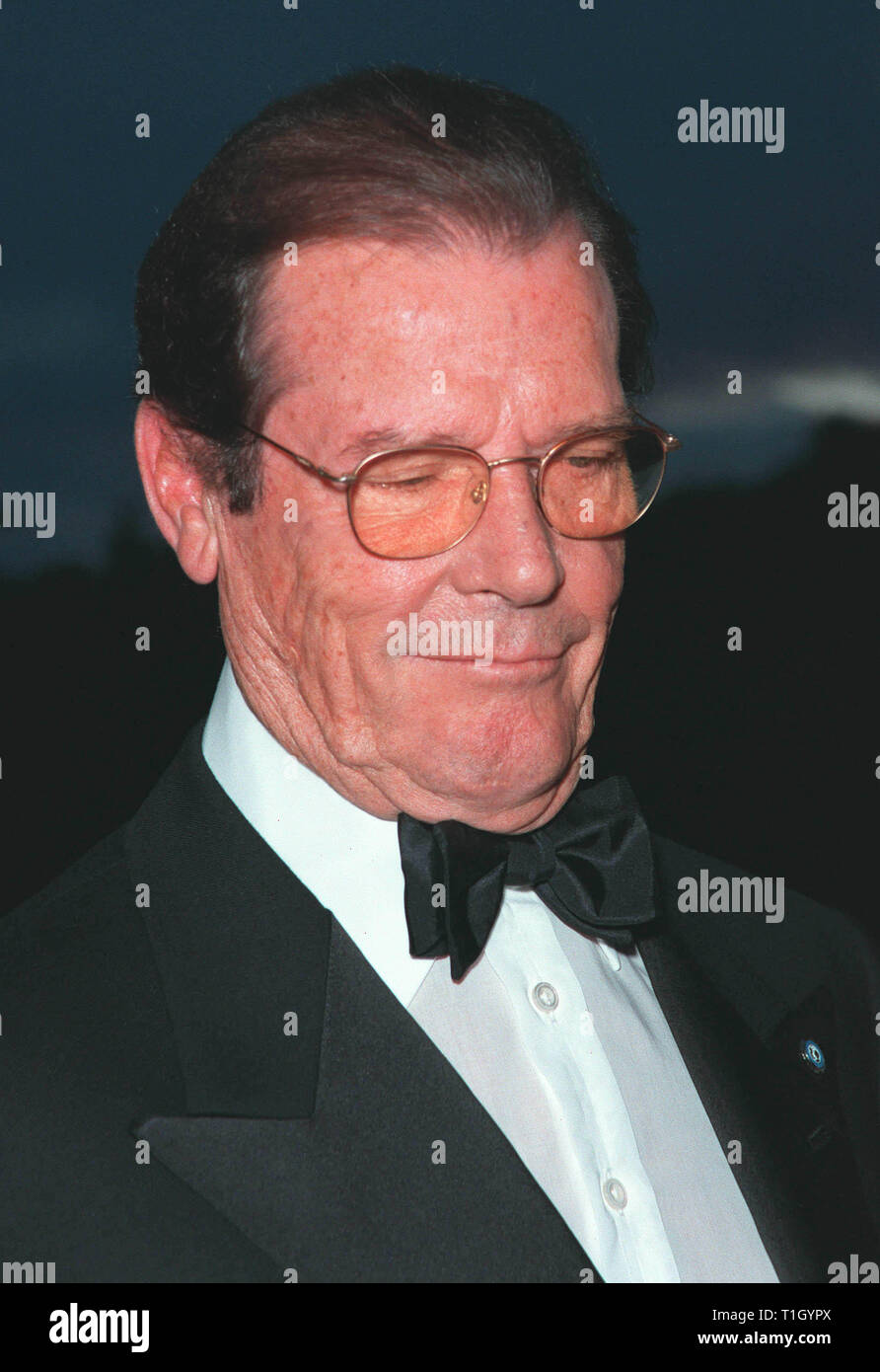 CANNES, FRANCE: 20 MAY 1999: Actor ROGER MOORE at the 6th annual Cinema ...