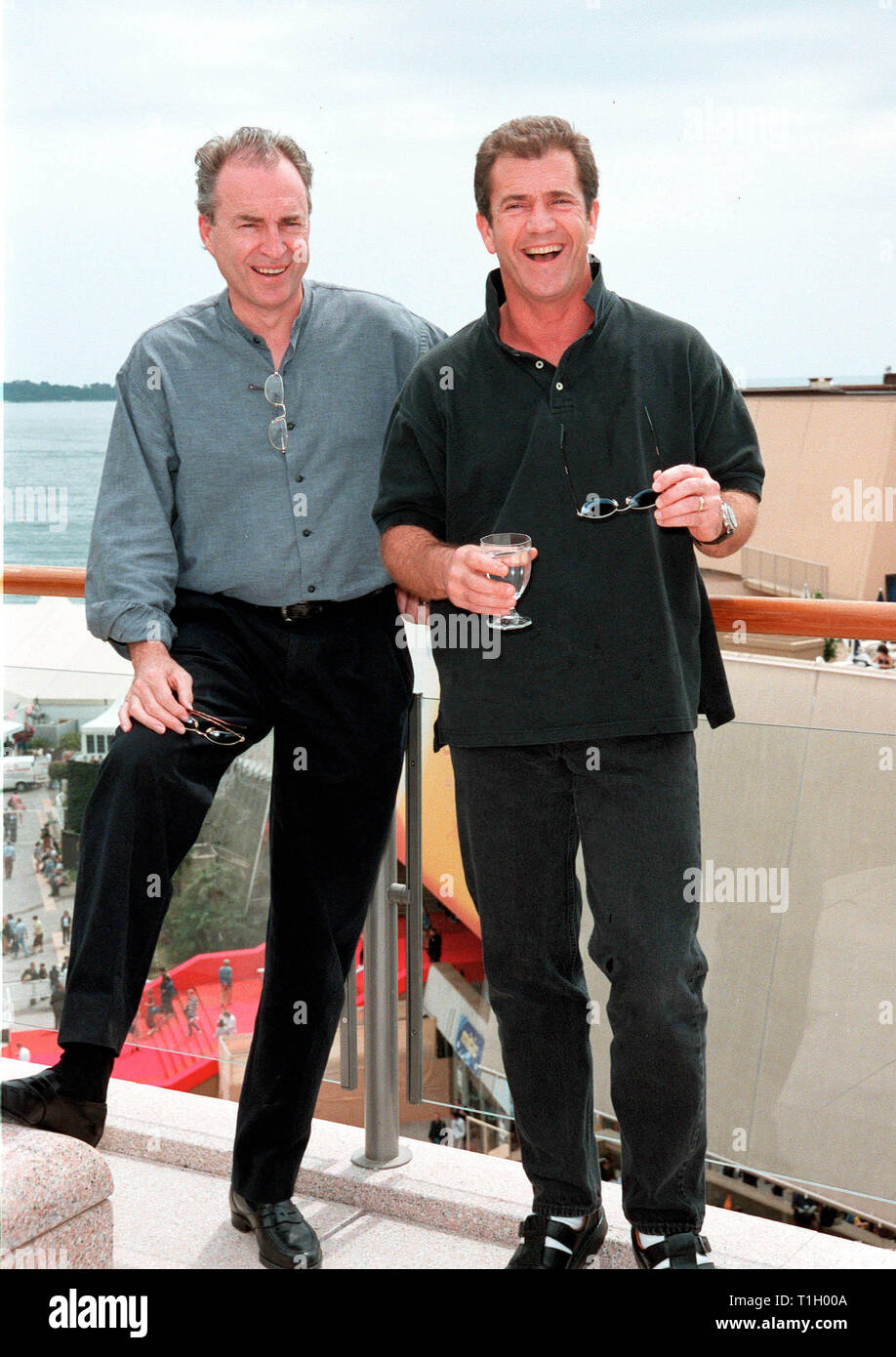 CANNES, FRANCE: 19 MAY 1999: Actor/producer MEL GIBSON (right ...