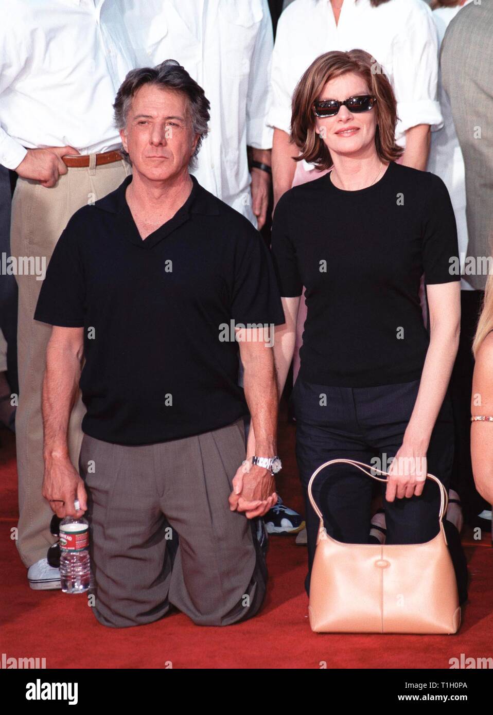 LOS ANGELES, CA. September 30, 1999: Actors Dustin Hoffman & Rene Russo ...