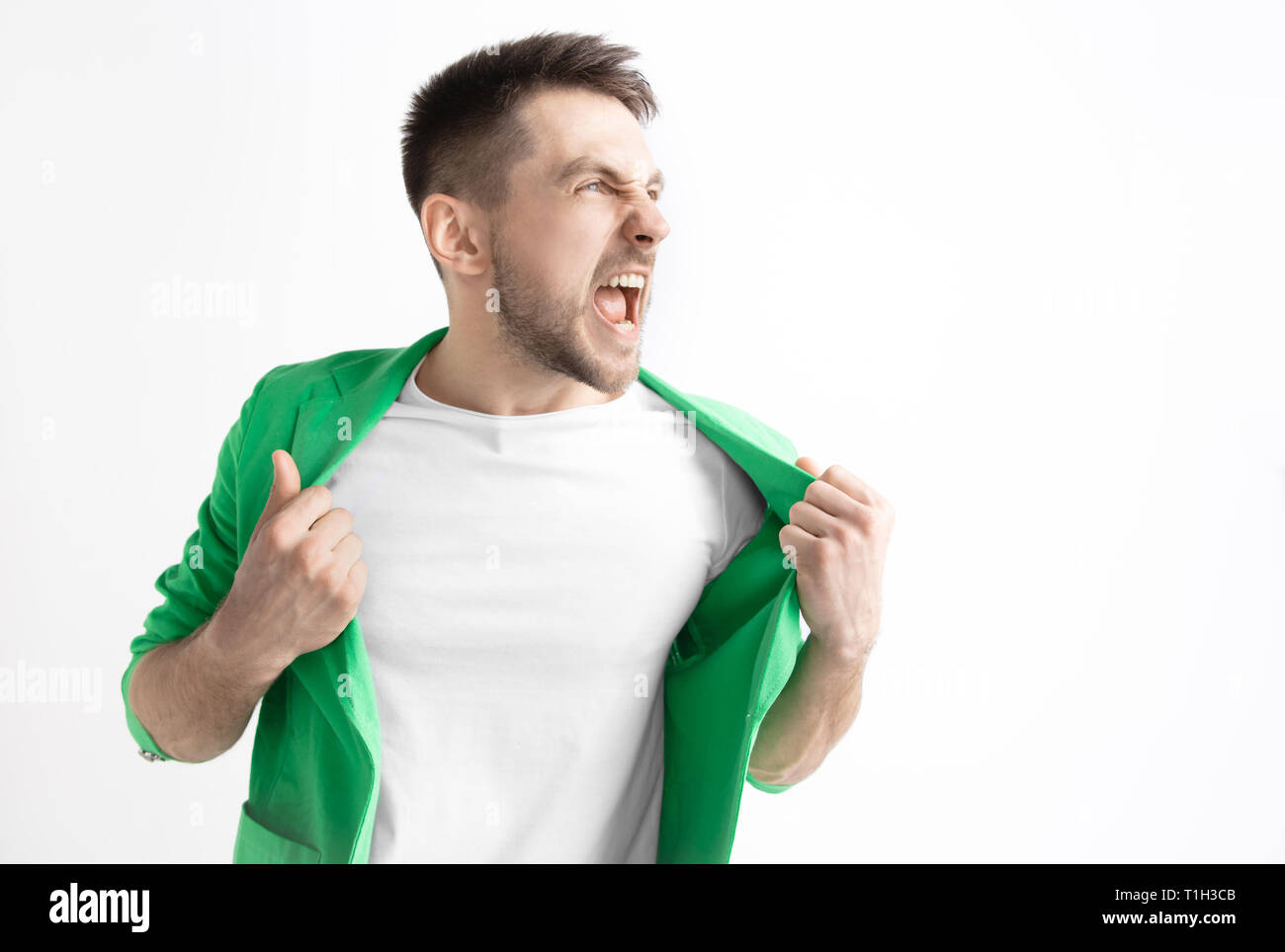 Young casual man shouting. Shout. Crying emotional man screaming on ...