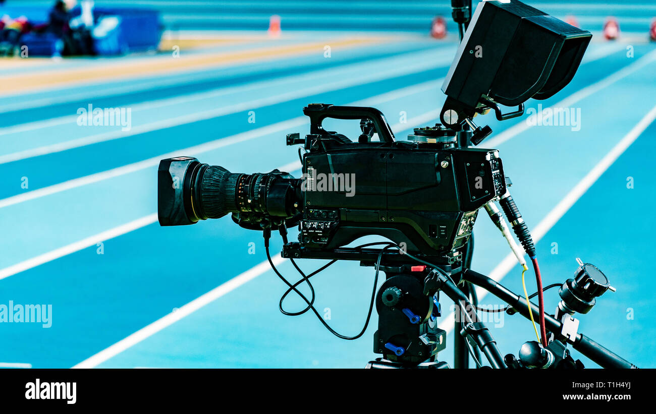 camera, TV broadcast on olympic track Stock Photo - Alamy