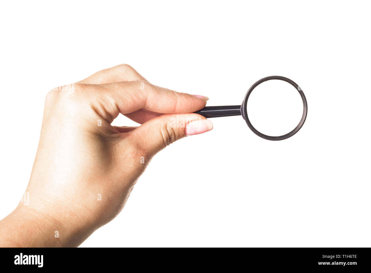 Hand holding magnifying glass isolated on white background Stock Photo ...
