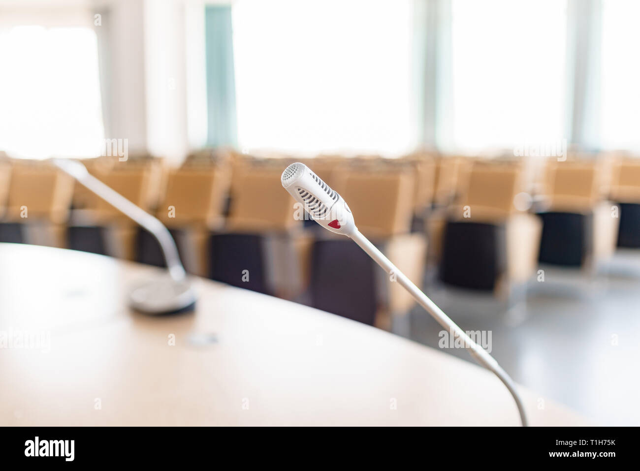 microphone close-up. Big empty modern conference hall in luxury hotel ...