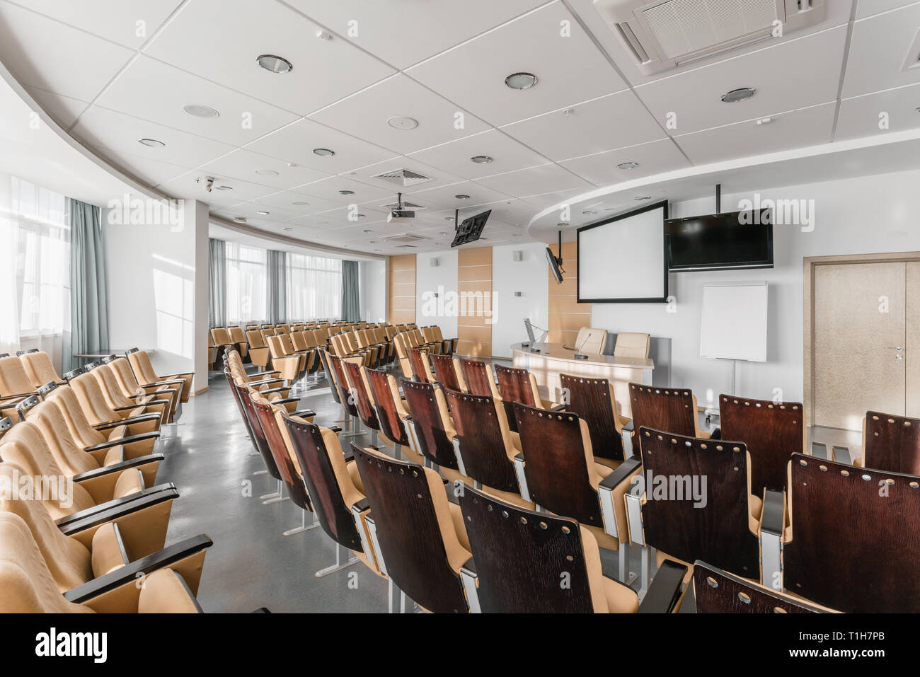Big empty modern conference hall in luxury hotel. Audience for Speakers ...