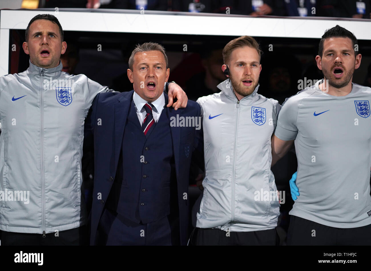 England U21 Manager Aidy Boothroyd (second left) sings the national ...