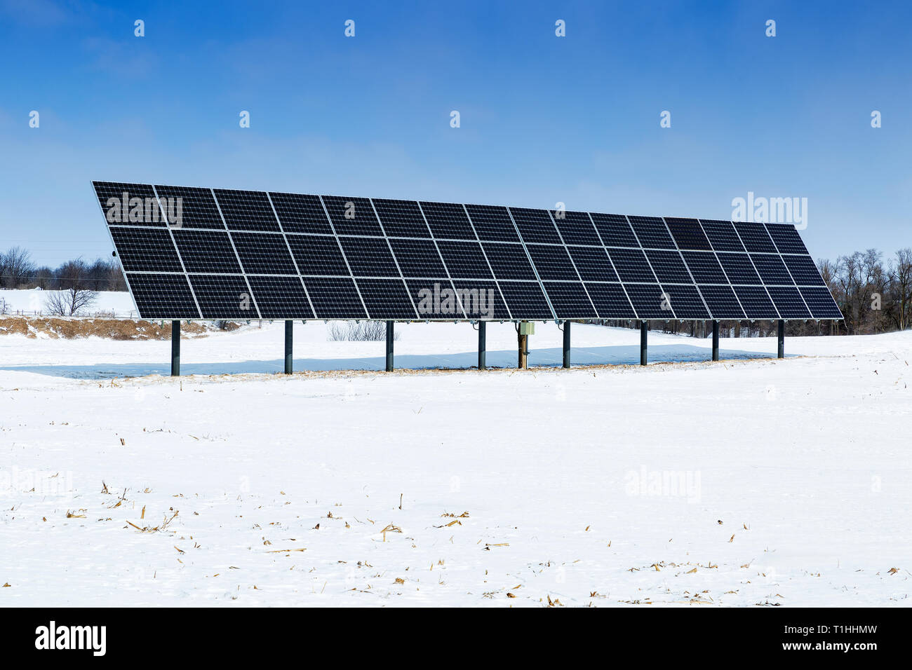 Solar panels covered with snow hi-res stock photography and images - Alamy
