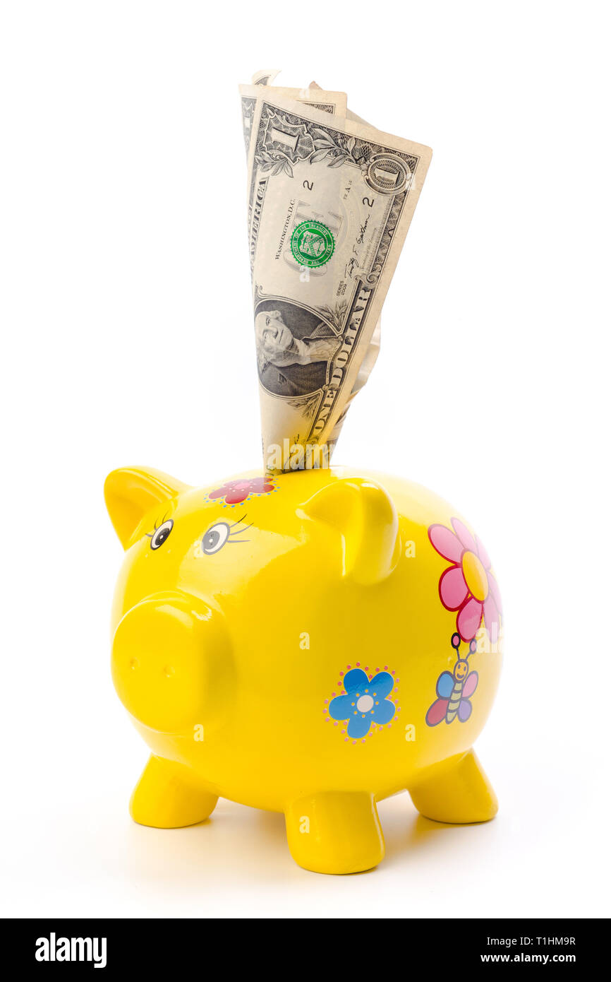 yellow piggy bank isolated on white Stock Photo - Alamy