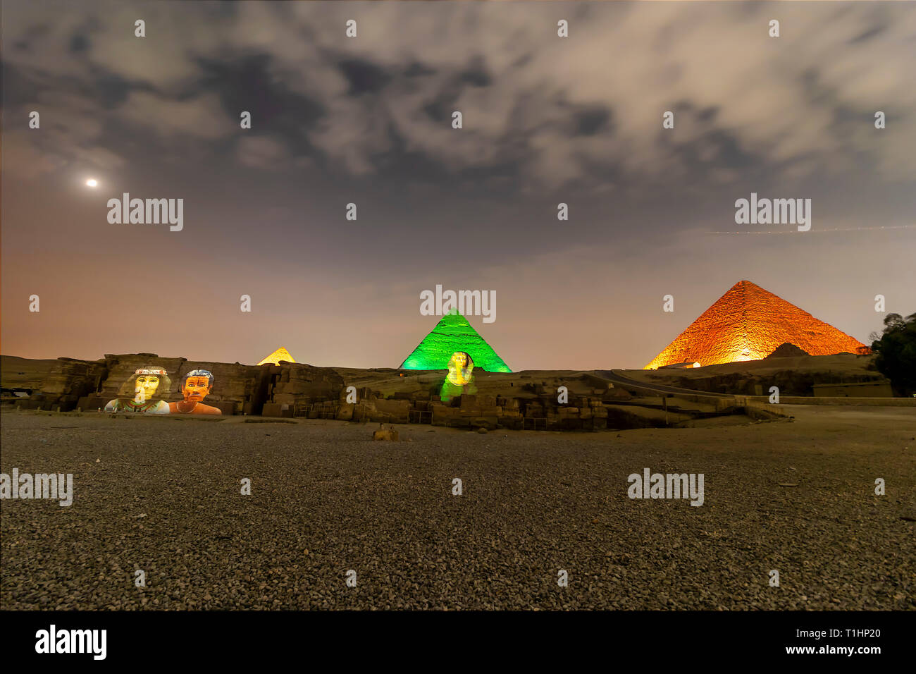 Giza pyramids and Sphinx light up at night Stock Photo - Alamy