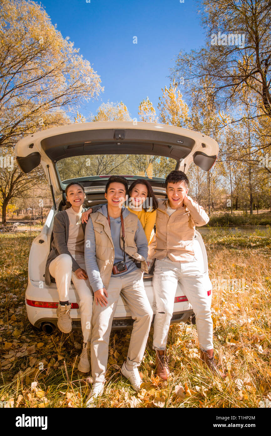 Young men and women in the outdoor outing Stock Photo - Alamy