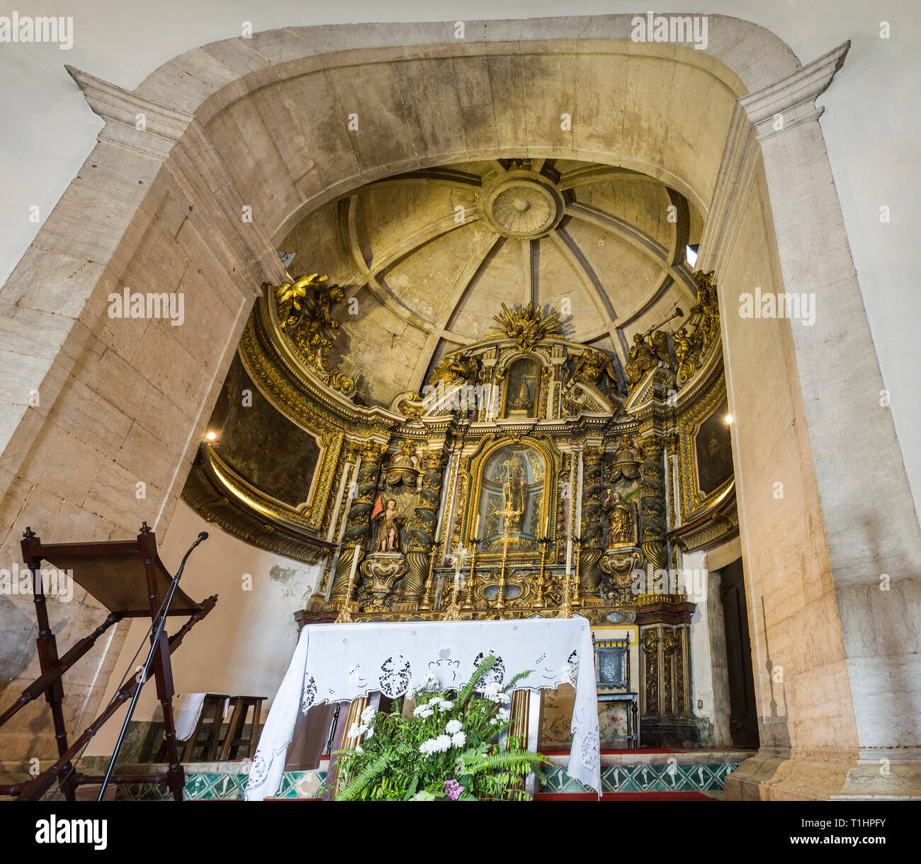 View of the gilded altarpiece in the main chapel of the Chapel of Saint ...