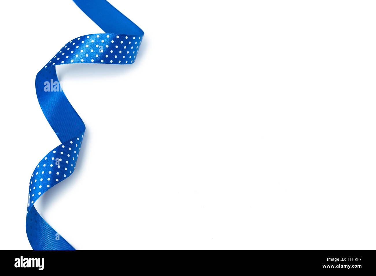 Shiny blue ribbon isolated on white Stock Photo - Alamy