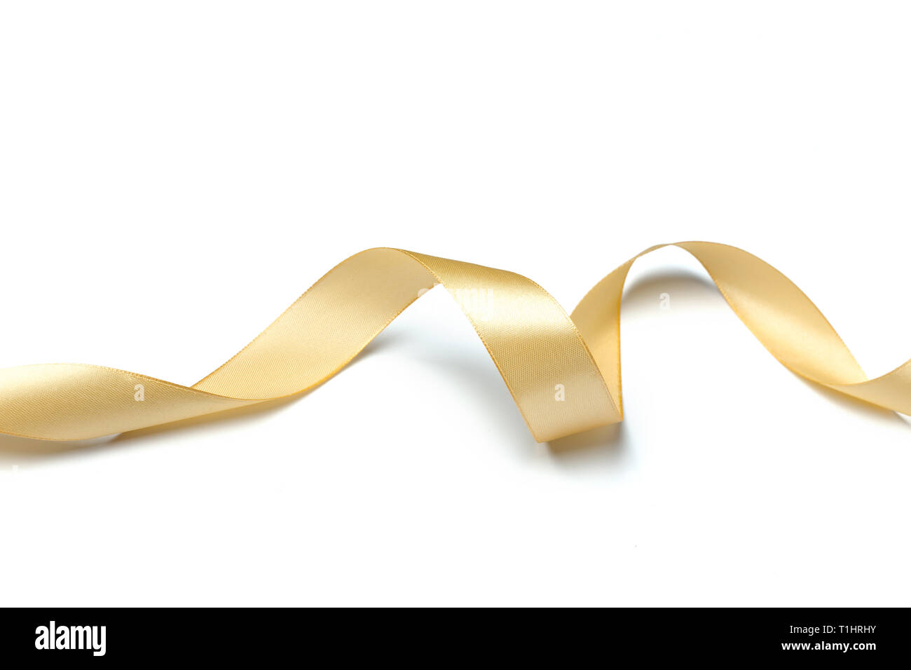 Golden ribbon collection isolated on white Stock Photo - Alamy
