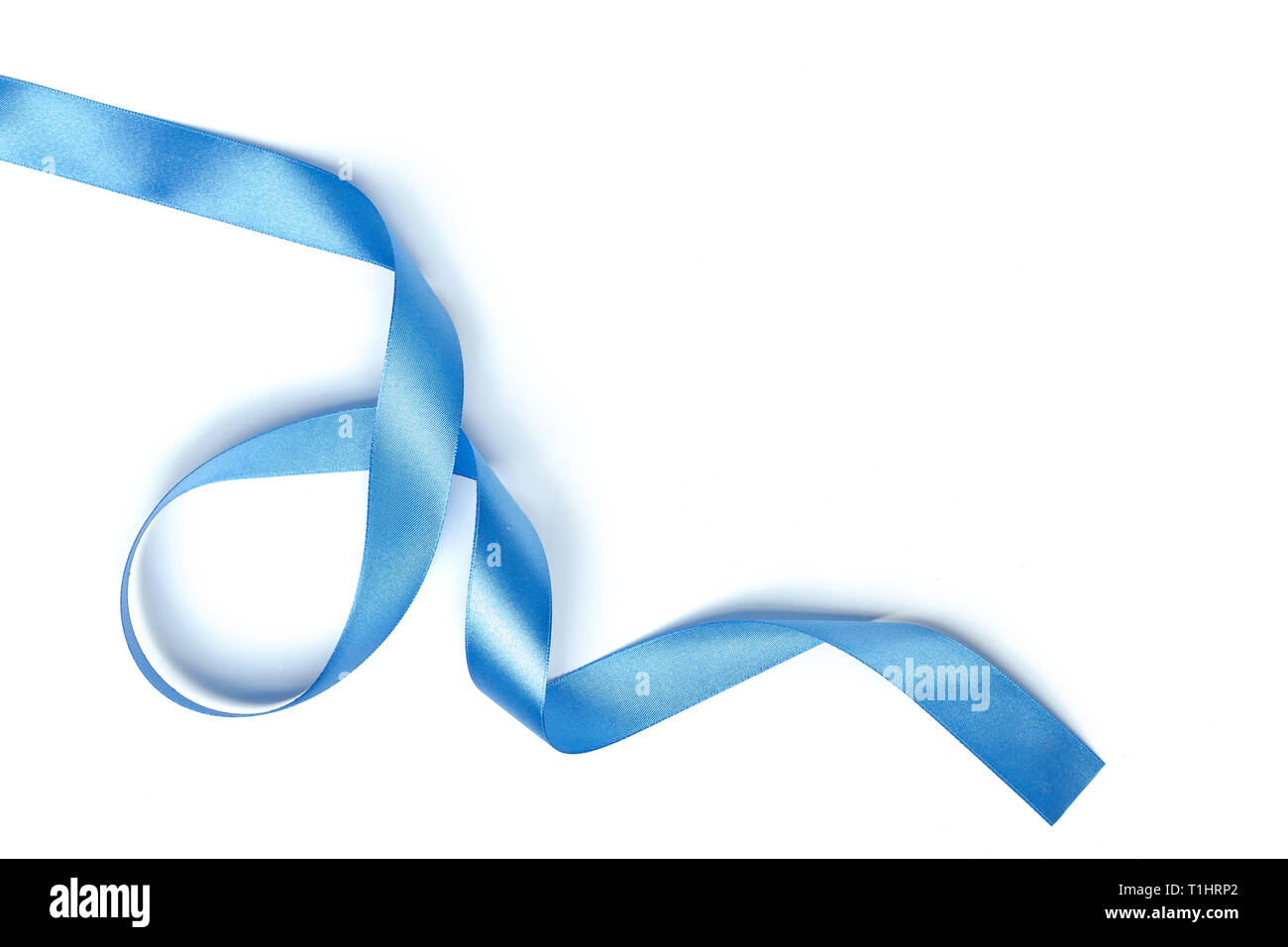 Shiny blue ribbon isolated on white Stock Photo - Alamy
